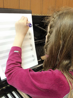 plp-girl-writing | Piano Keyboard Remote